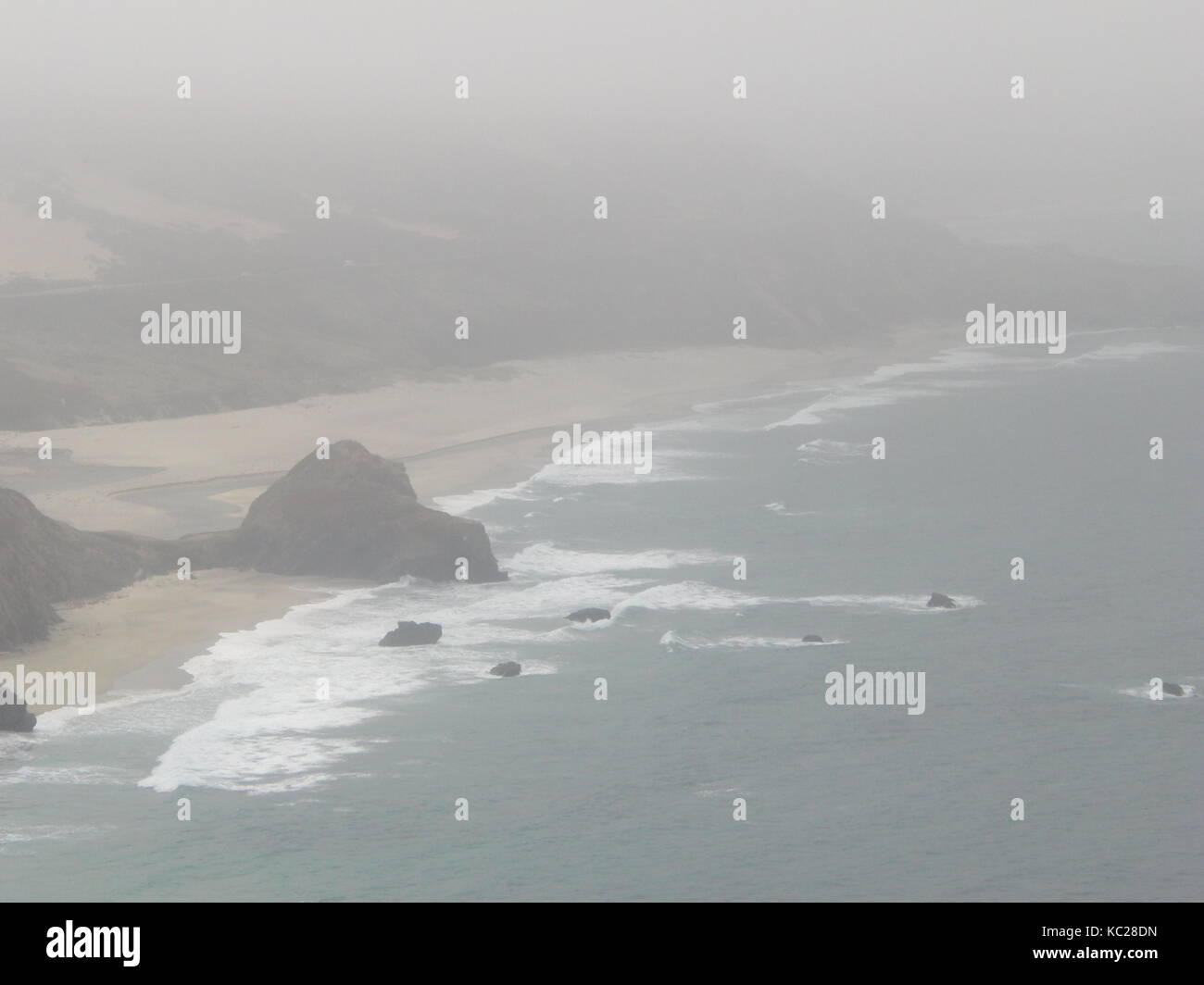 Misty ocean shore view Stock Photo - Alamy