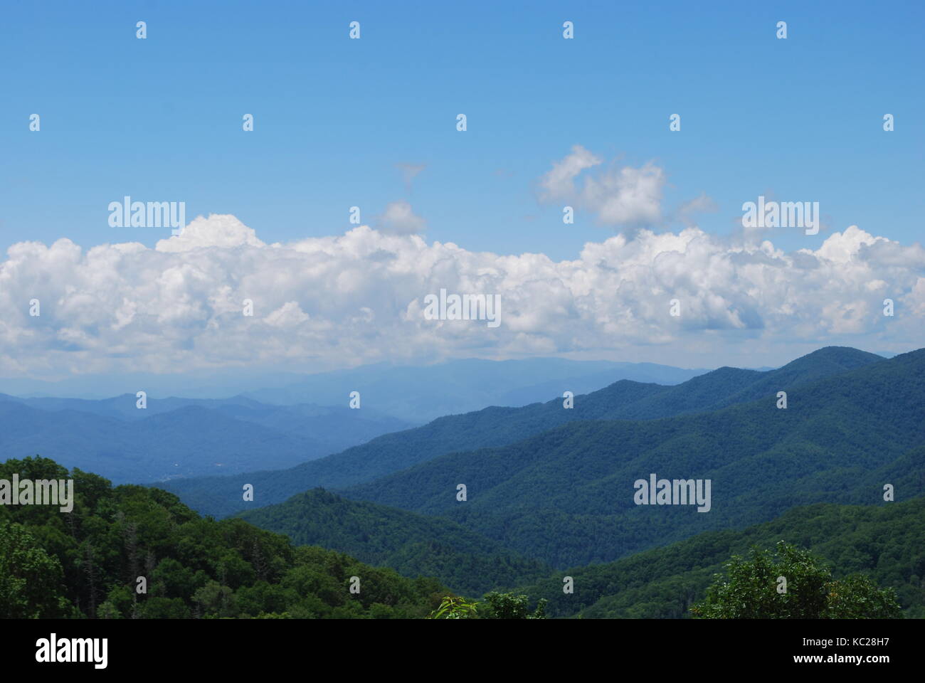 Mountain landscape in blue shades Stock Photo - Alamy