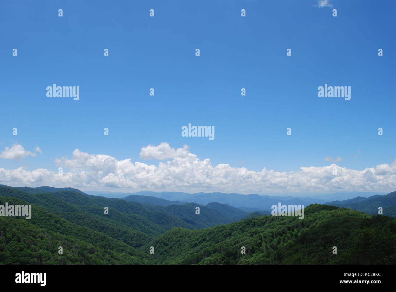 Panoramic view with open horizon mountain and clouds Stock Photo - Alamy
