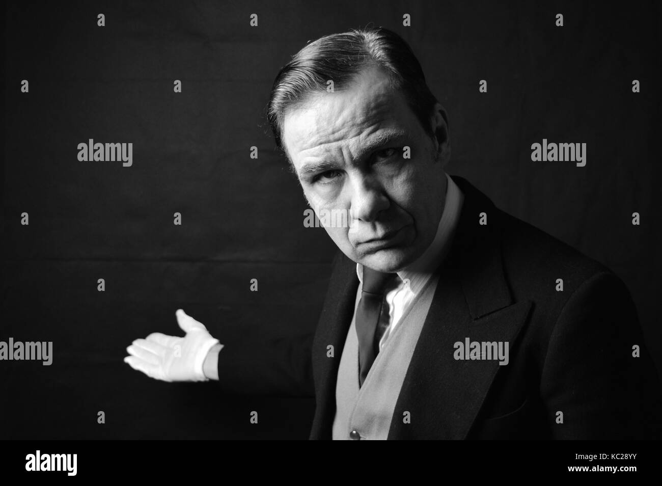 Butler with tray Stock Photo - Alamy