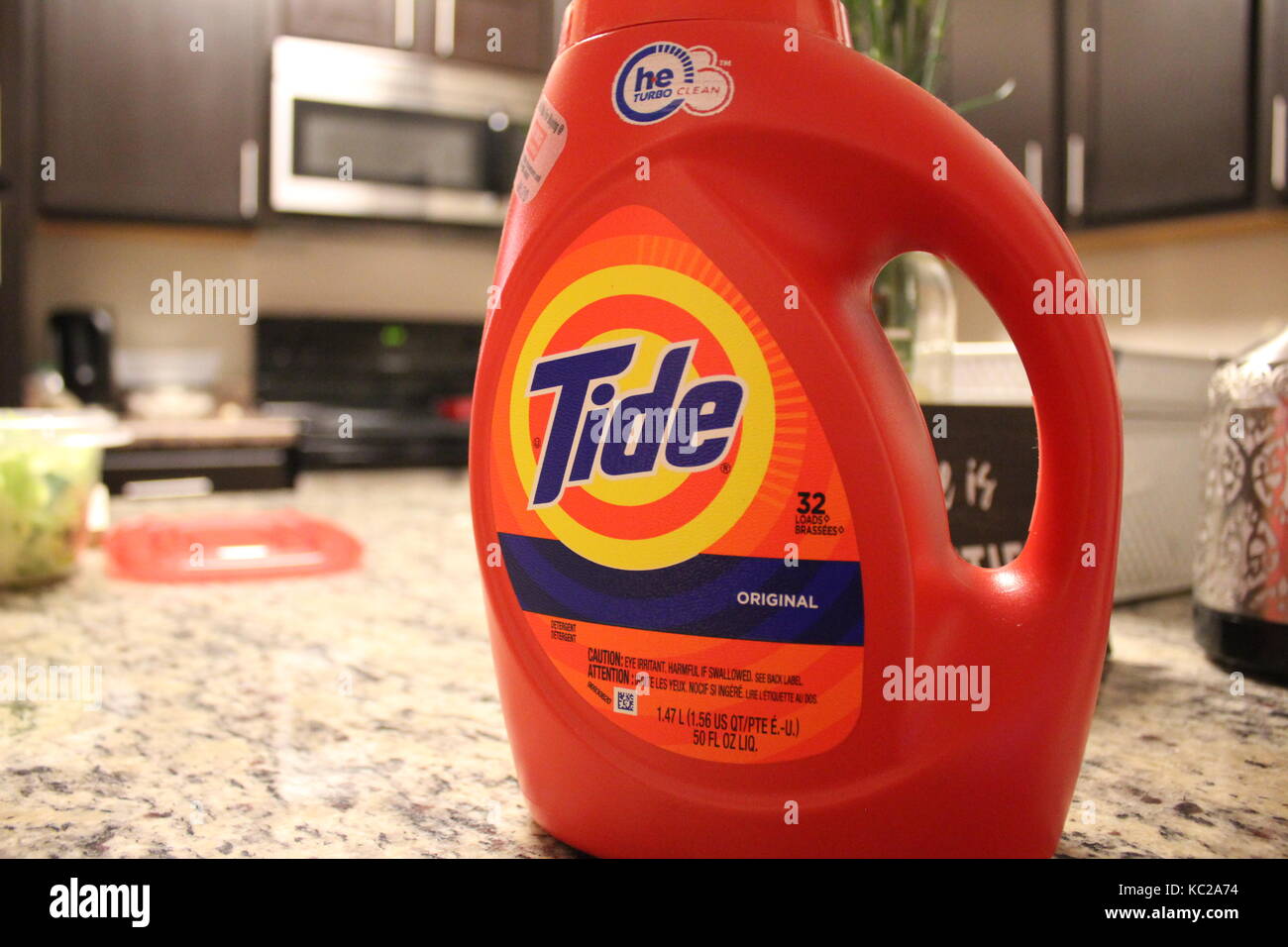 Tide clothes detergent bottle Stock Photo - Alamy