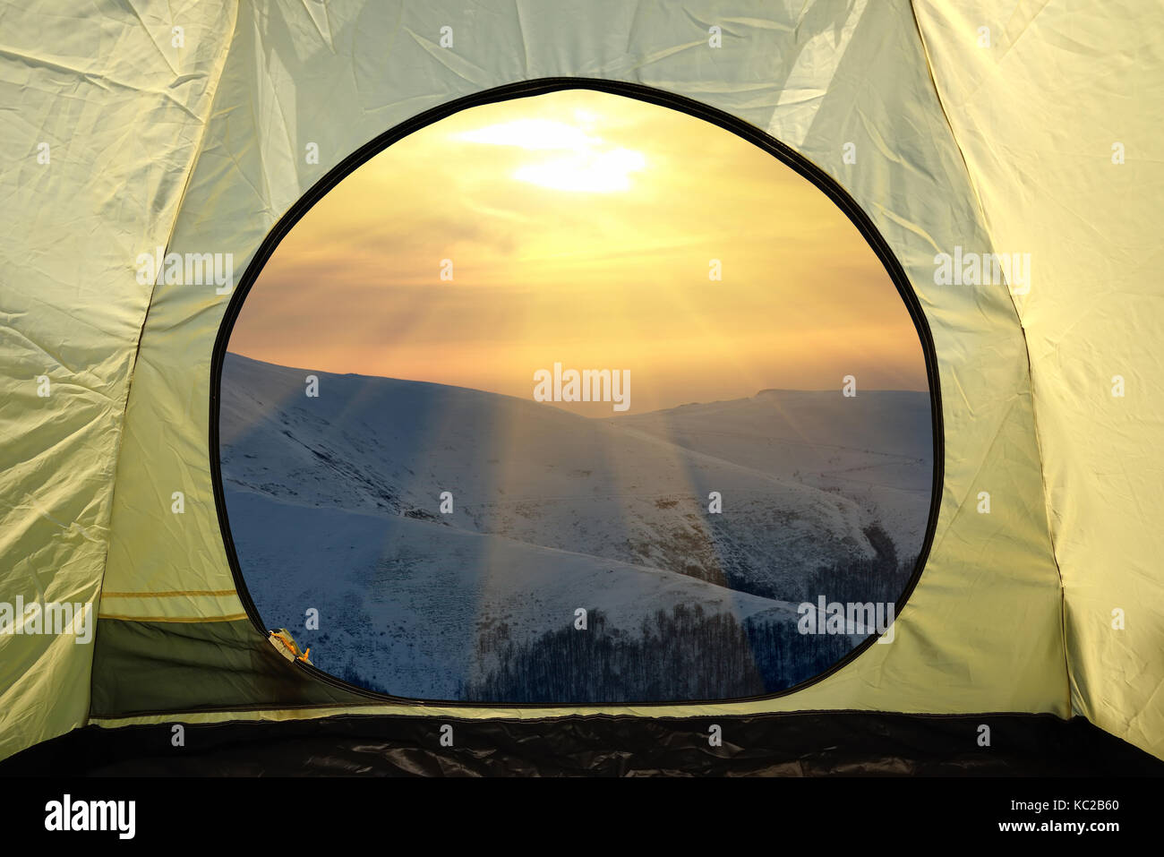View from inside a tent on mountains landscape. Travel lifestyle ...