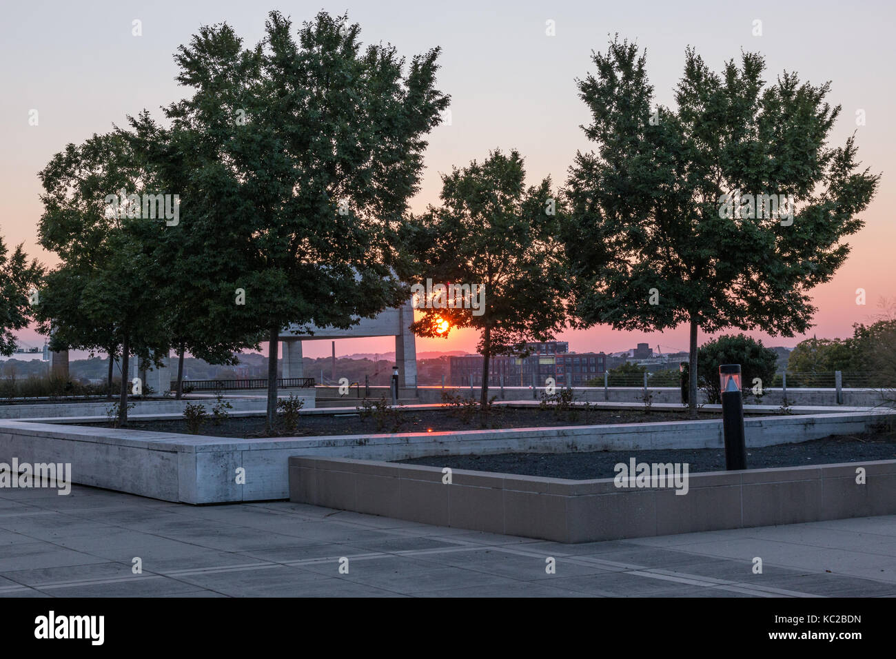 Sunset across courtyard Stock Photo - Alamy