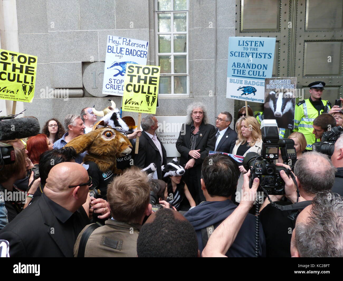 Brian May protests against badger culling outside DEFRA headquarters ...