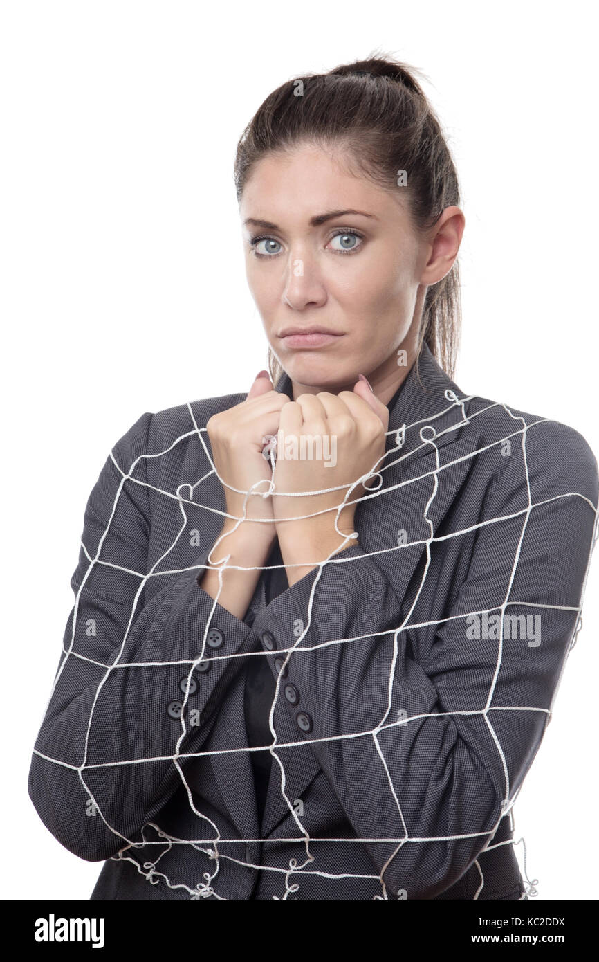 business woman caught up in a net Stock Photo - Alamy