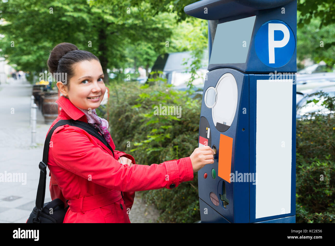 Woman parking meter hi-res stock photography and images - Alamy