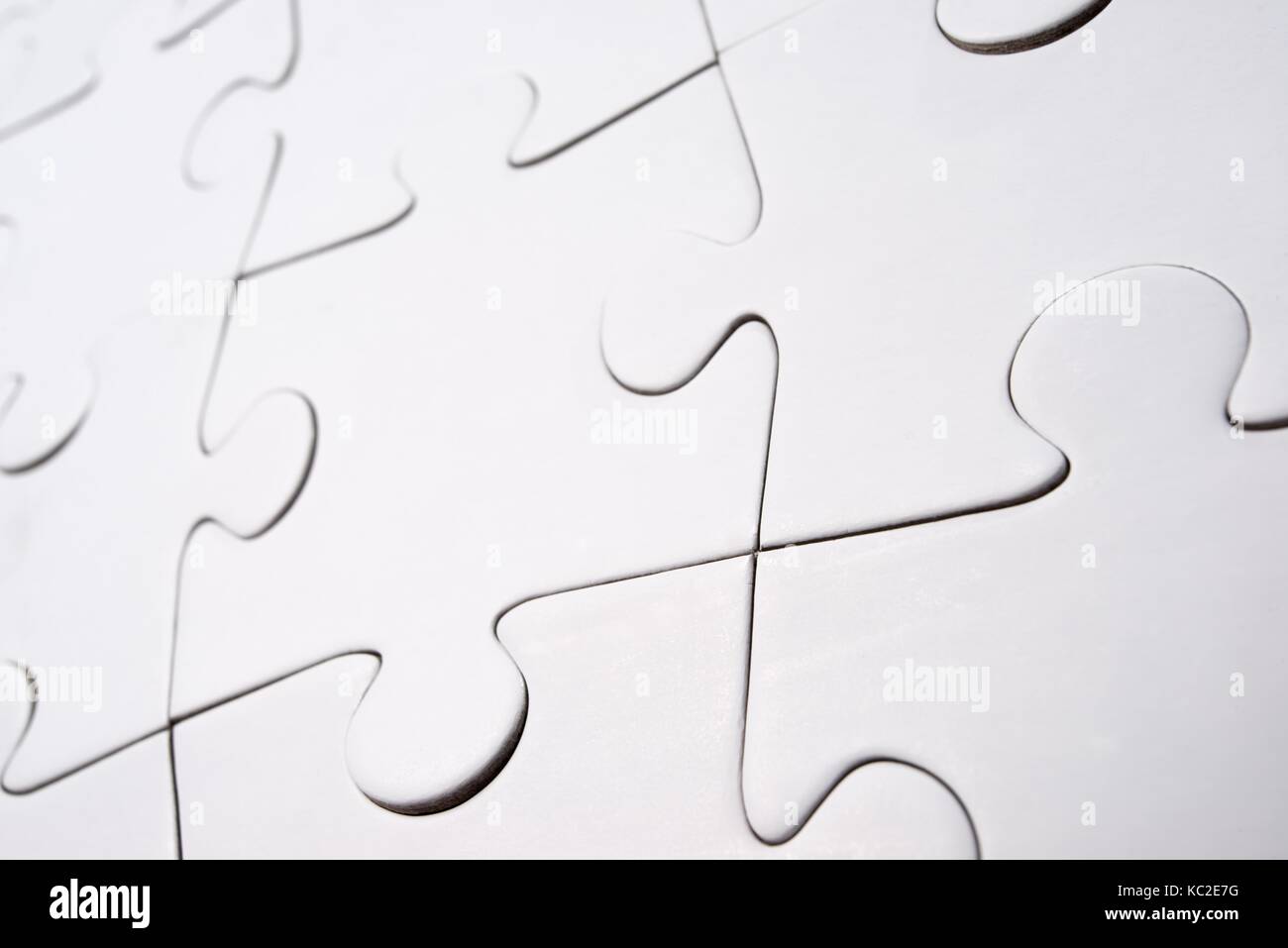 Close up of the pieces of a puzzle Stock Photo - Alamy