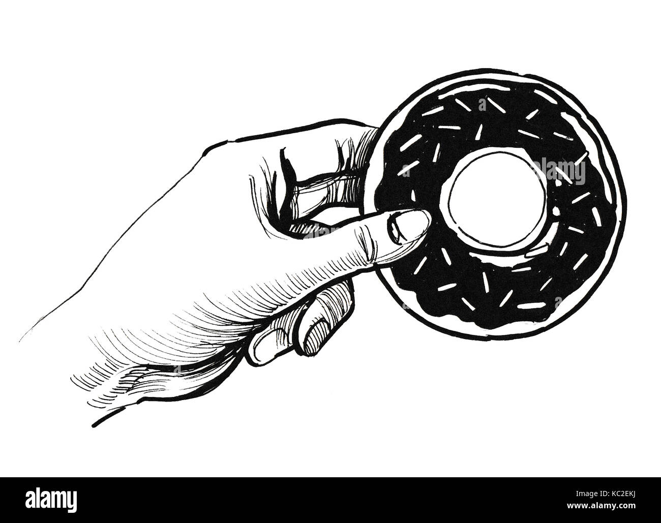 Hand with a donut Stock Photo - Alamy