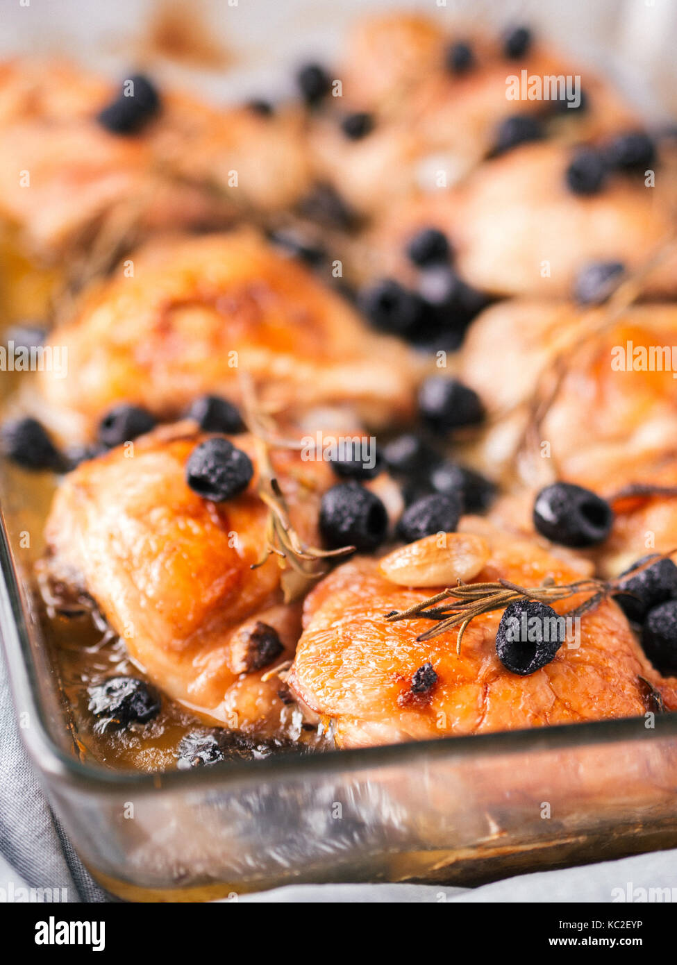 Corsican chicken thighs with rosemary and black olives Stock Photo - Alamy