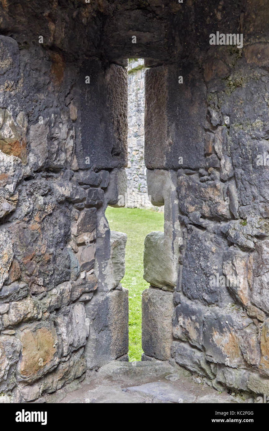 Loophole in the form of cross in castle Stock Photo - Alamy