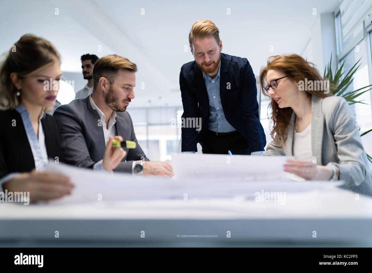 Group of architects working on business meeting Stock Photo - Alamy