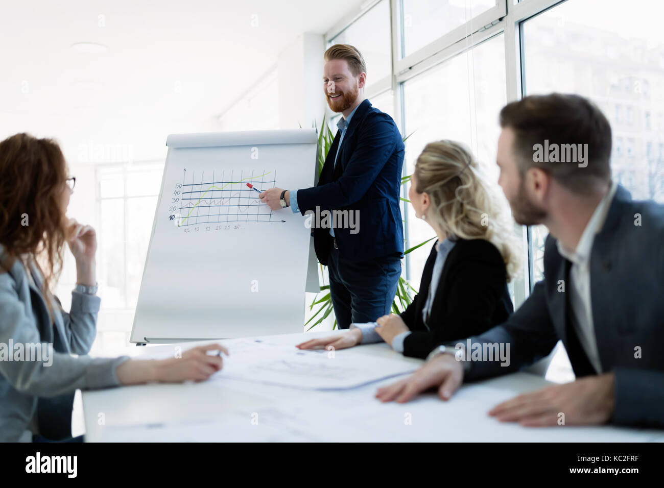 Group of architects working on business meeting Stock Photo - Alamy