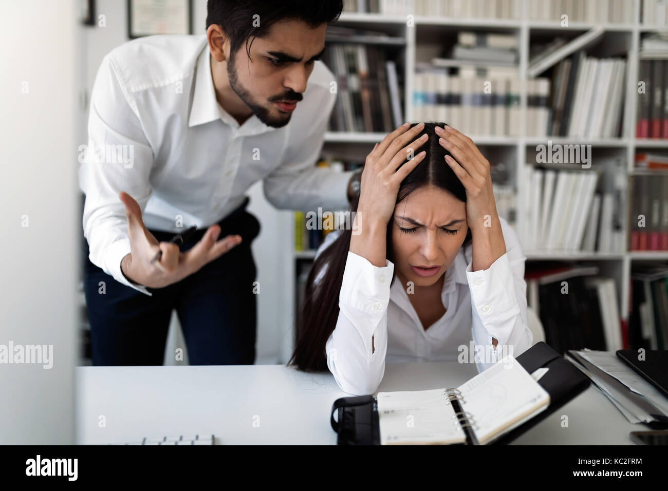 Picture of angry boss criticizing his worker Stock Photo - Alamy
