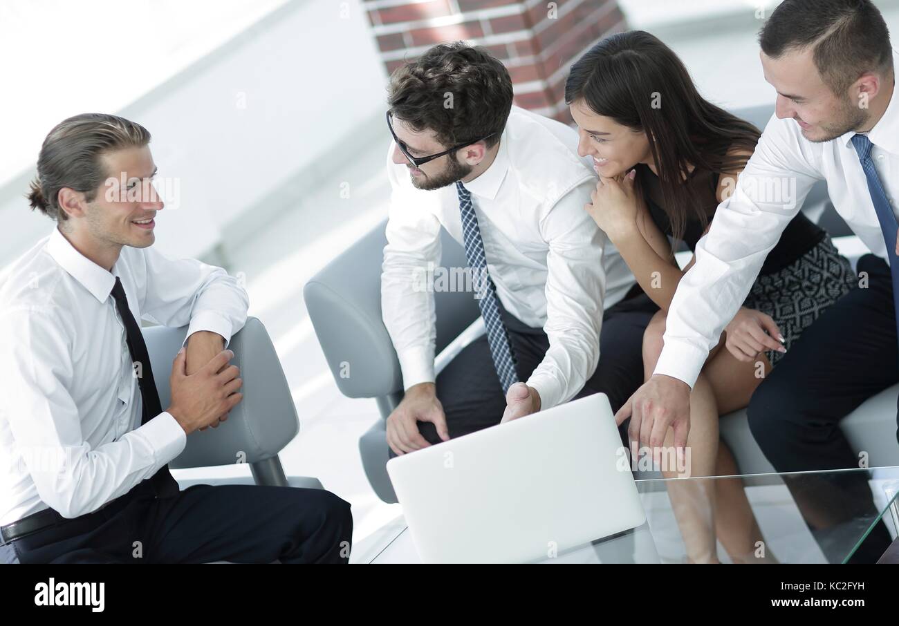 employees sitting in the lobby of the office Stock Photo - Alamy