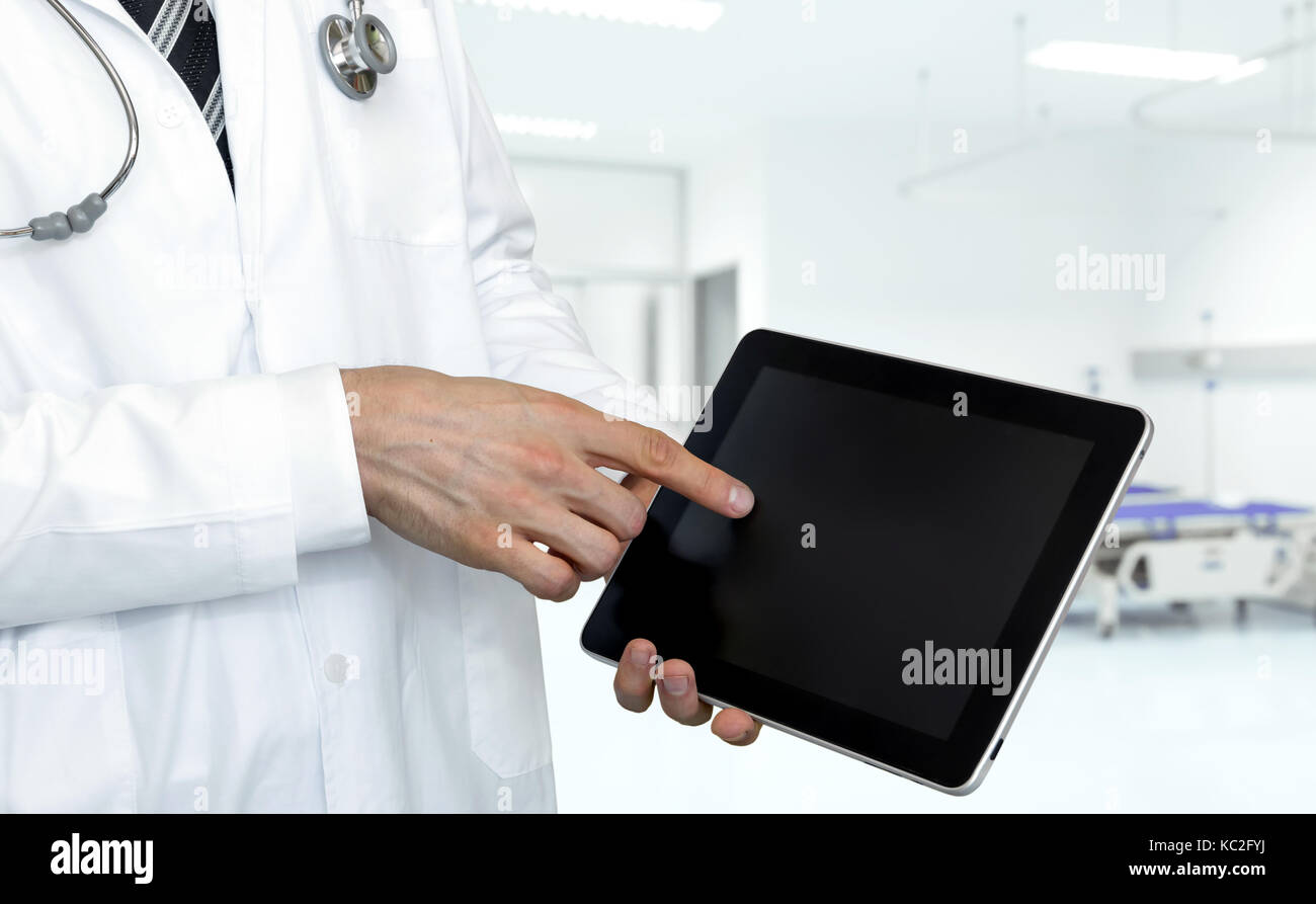 Smart healthcare technology concept. Doctor point finger to black ...