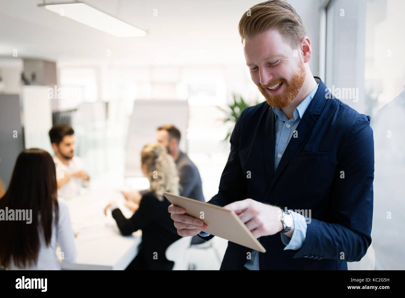Portrait of young handsome architect on meeting Stock Photo - Alamy