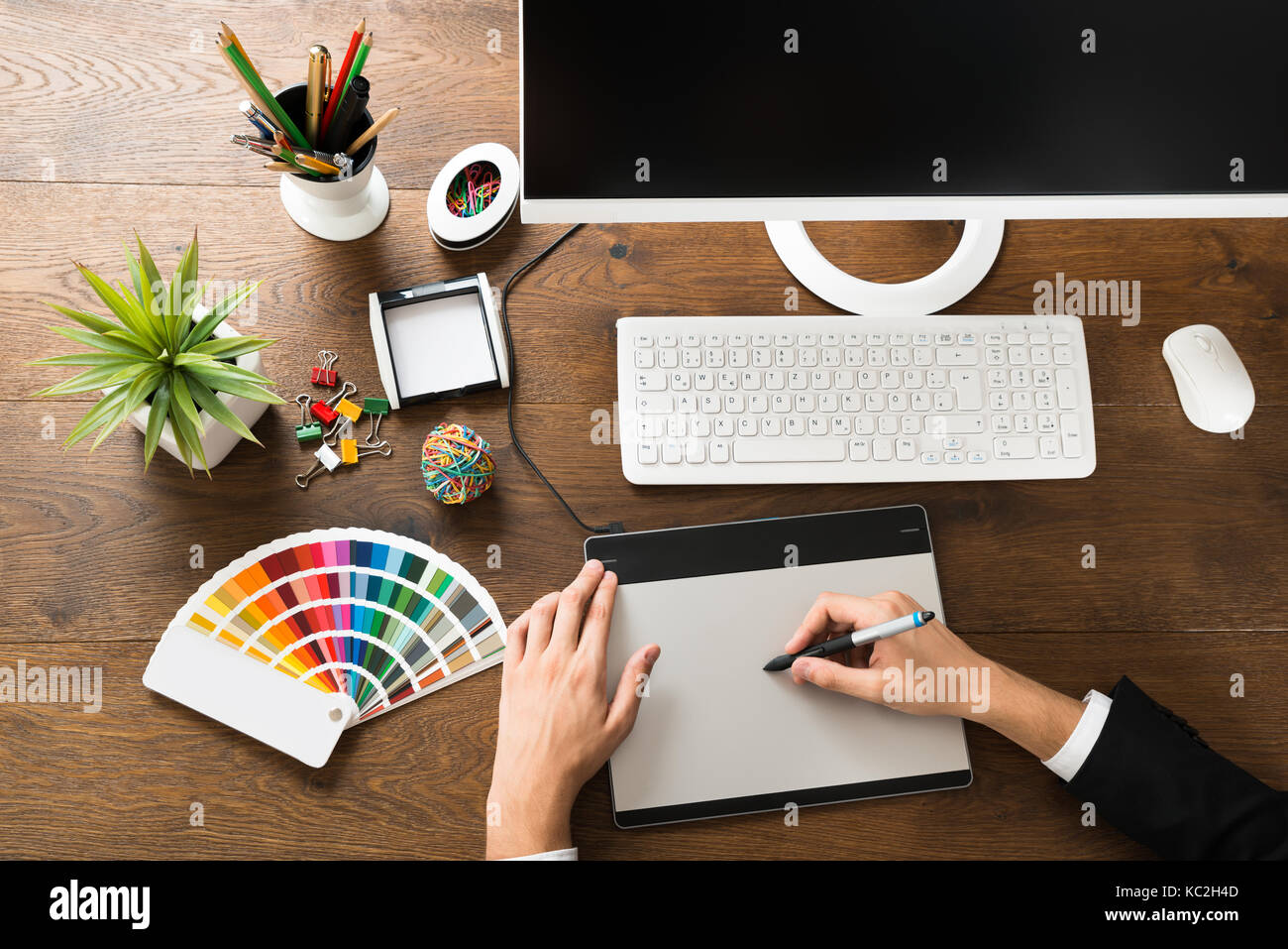 Young Male Designer Using Digital Graphic Tablet With Stylus At Desk ...