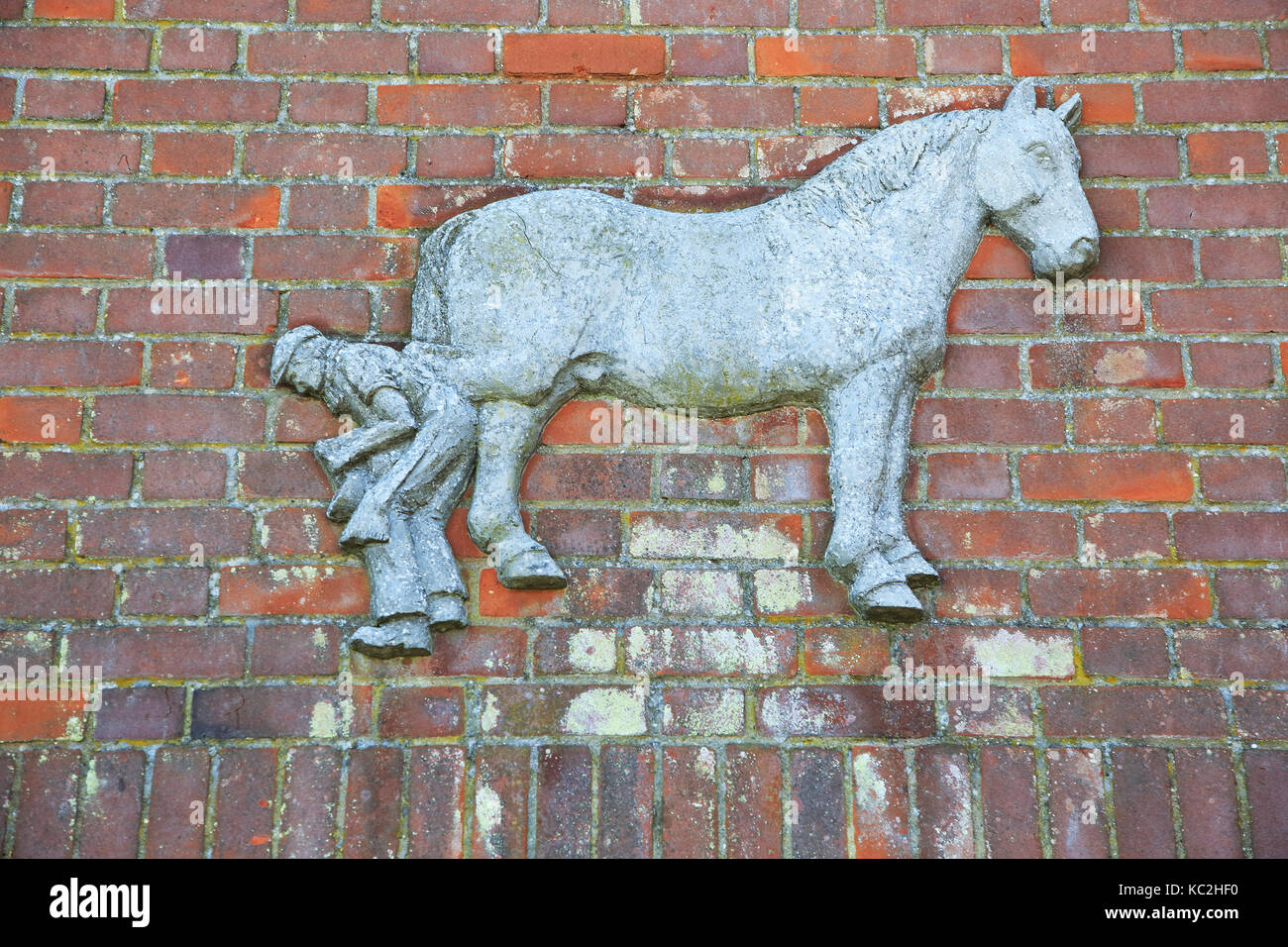 Old sign for farrier and horse on brick wall, Brandeston, Suffolk ...
