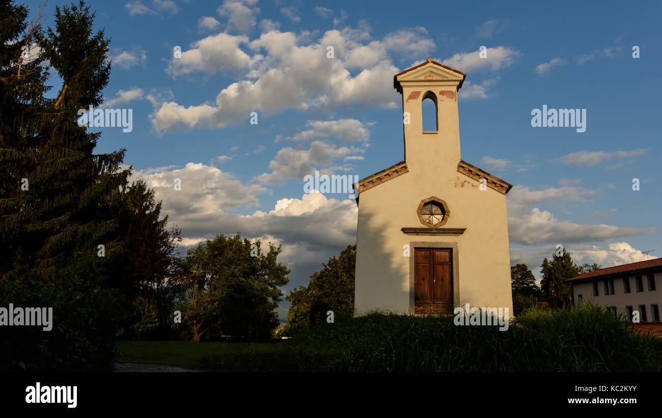 Countryside church at sunset Stock Photo - Alamy