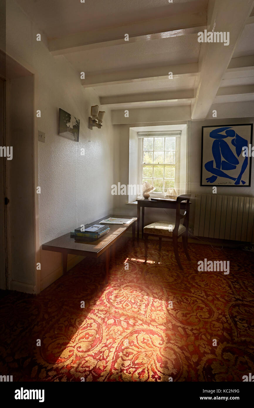 Quaint house interior; rooms with shadows and sunlit windows. Old feel ...