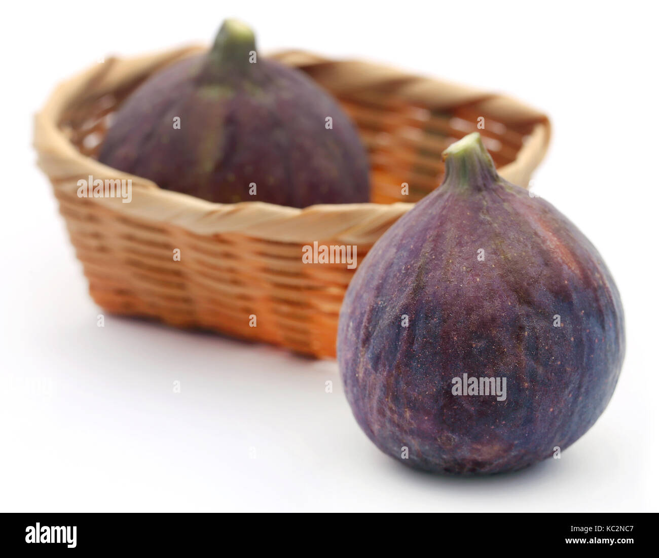 Fresh organic common figs over white background Stock Photo - Alamy