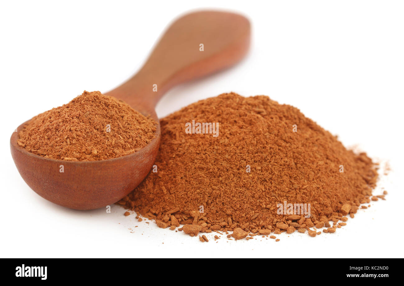 Ground cinnamon over white background Stock Photo - Alamy