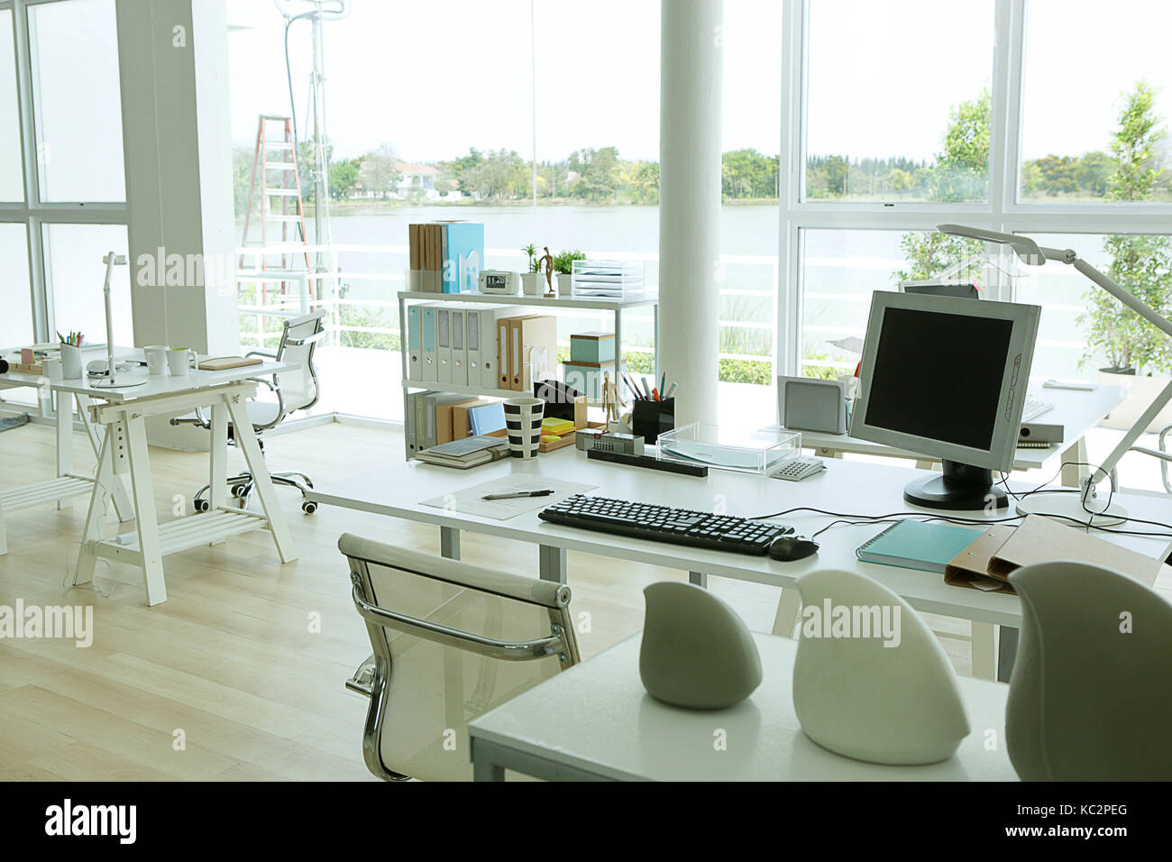the modern office desk have a good view near by the lake Stock Photo ...