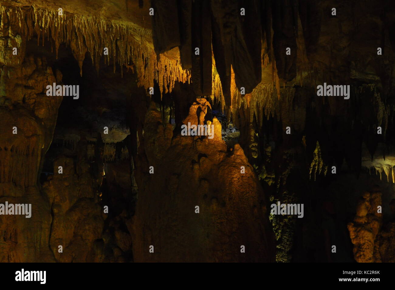 Prometheus Cave. Georgia. Stalactites and stalagmites highlighted ...