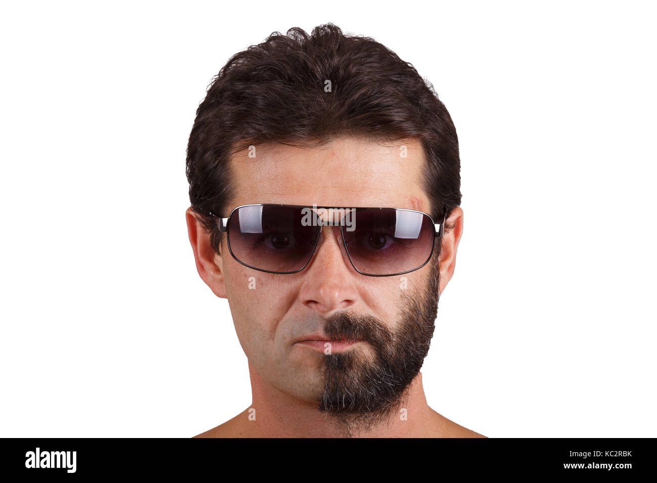 split personality - portrait of man with half shaved and unshaven face ...