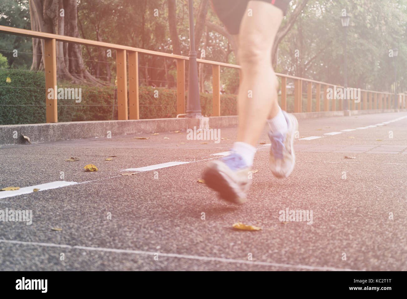 running on the road at public park Stock Photo - Alamy