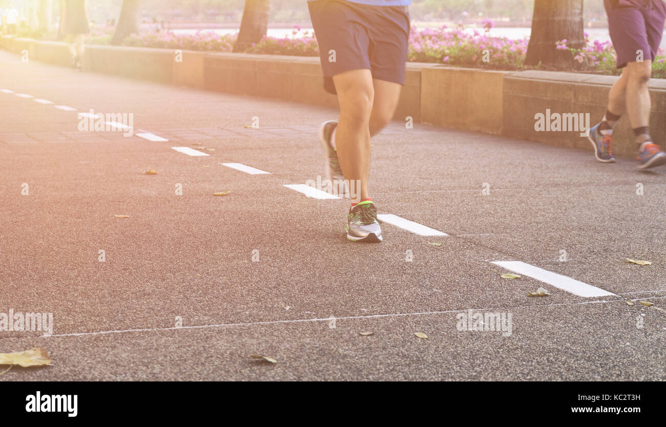 running on the road at public park Stock Photo - Alamy