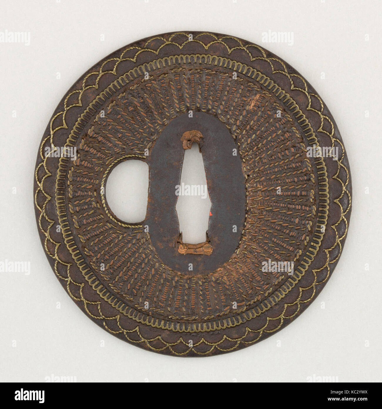 Sword Guard (Tsuba), ca. 1700, Japanese, Iron, brass, copper, H. 3 1/8 ...