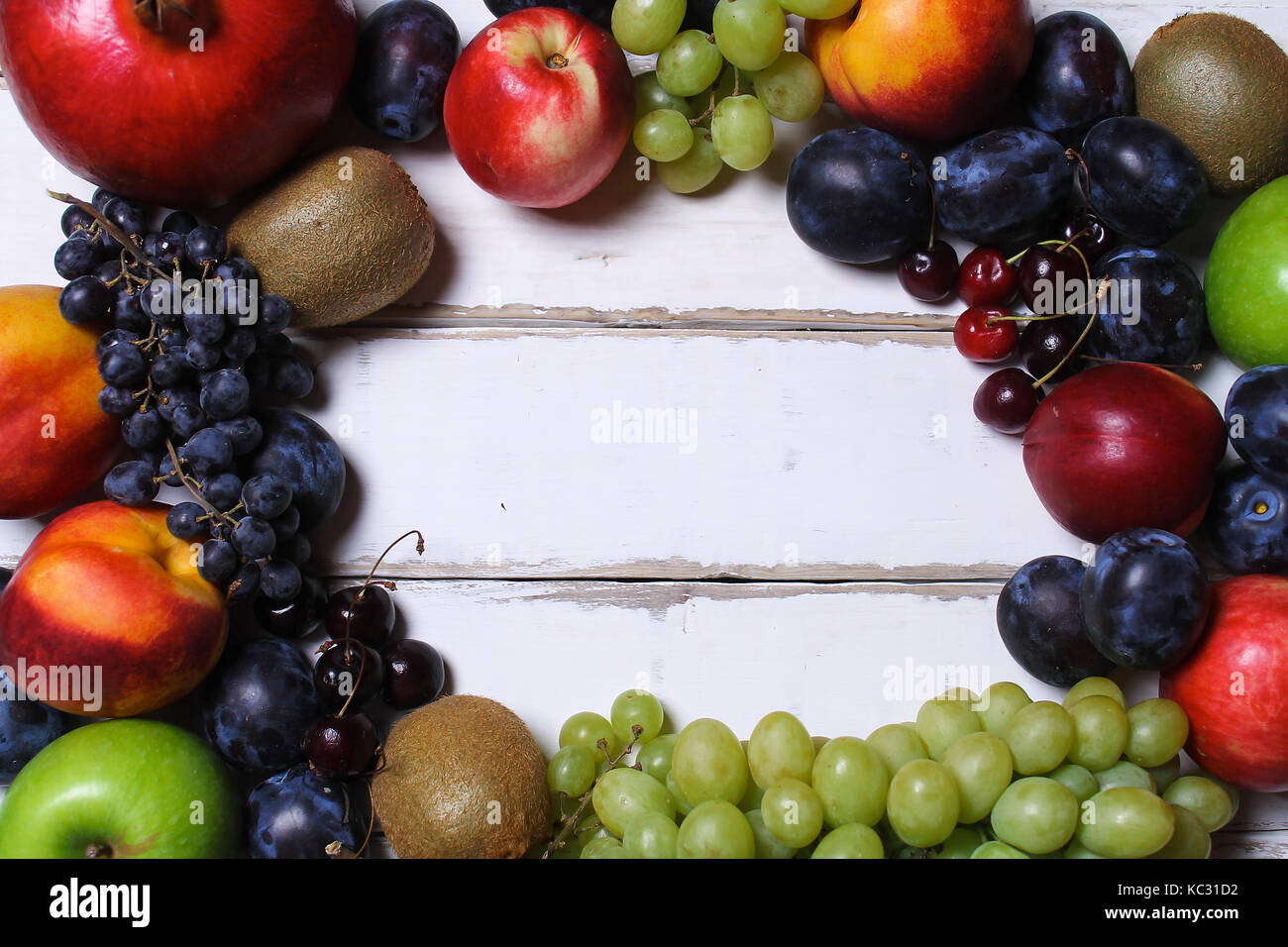 Fruits on a wooden table Stock Photo - Alamy