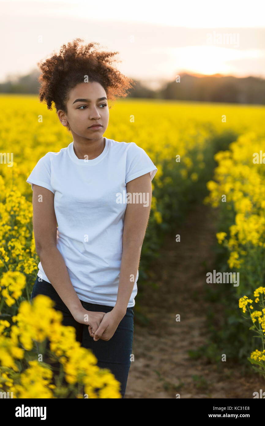 Sad Girl In Field Of Flowers