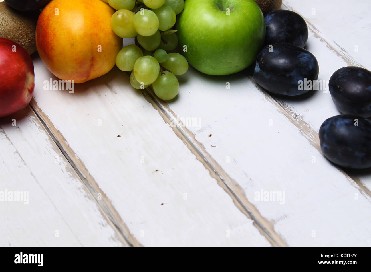 A handful of fruit on the table Stock Photo - Alamy