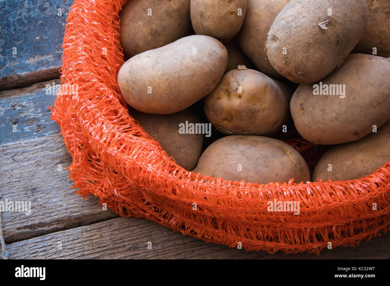 Raw potatoes in net hi-res stock photography and images - Alamy