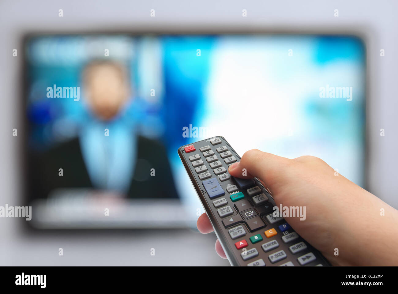 man hand switches TV channels. Nature. Abstract. remote control in hand ...