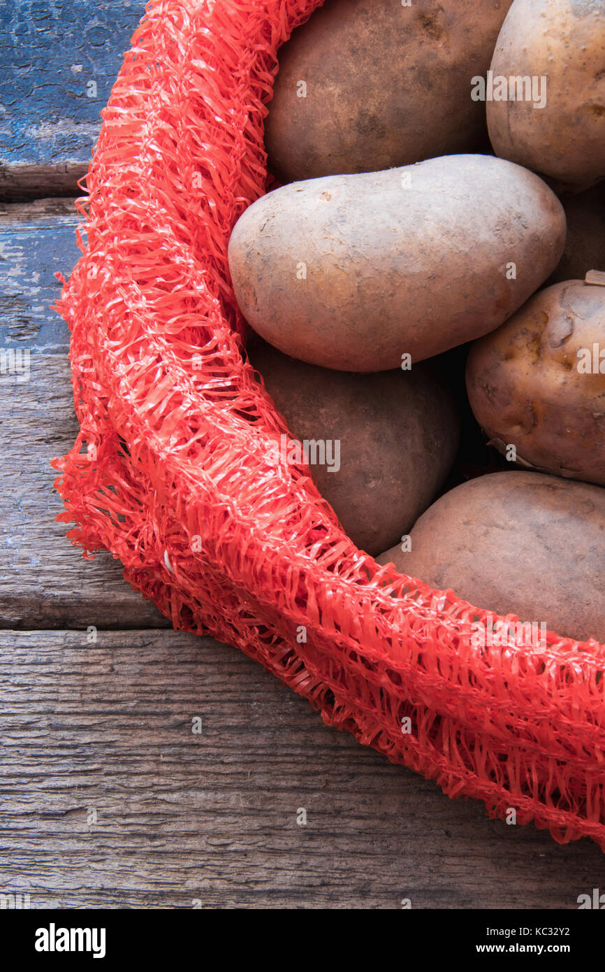 Raw potatoes in net hi-res stock photography and images - Alamy