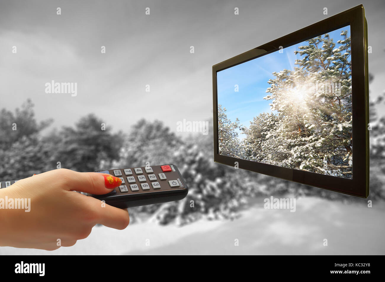 girl hand switches TV channels. Nature. Abstract. remote control in ...