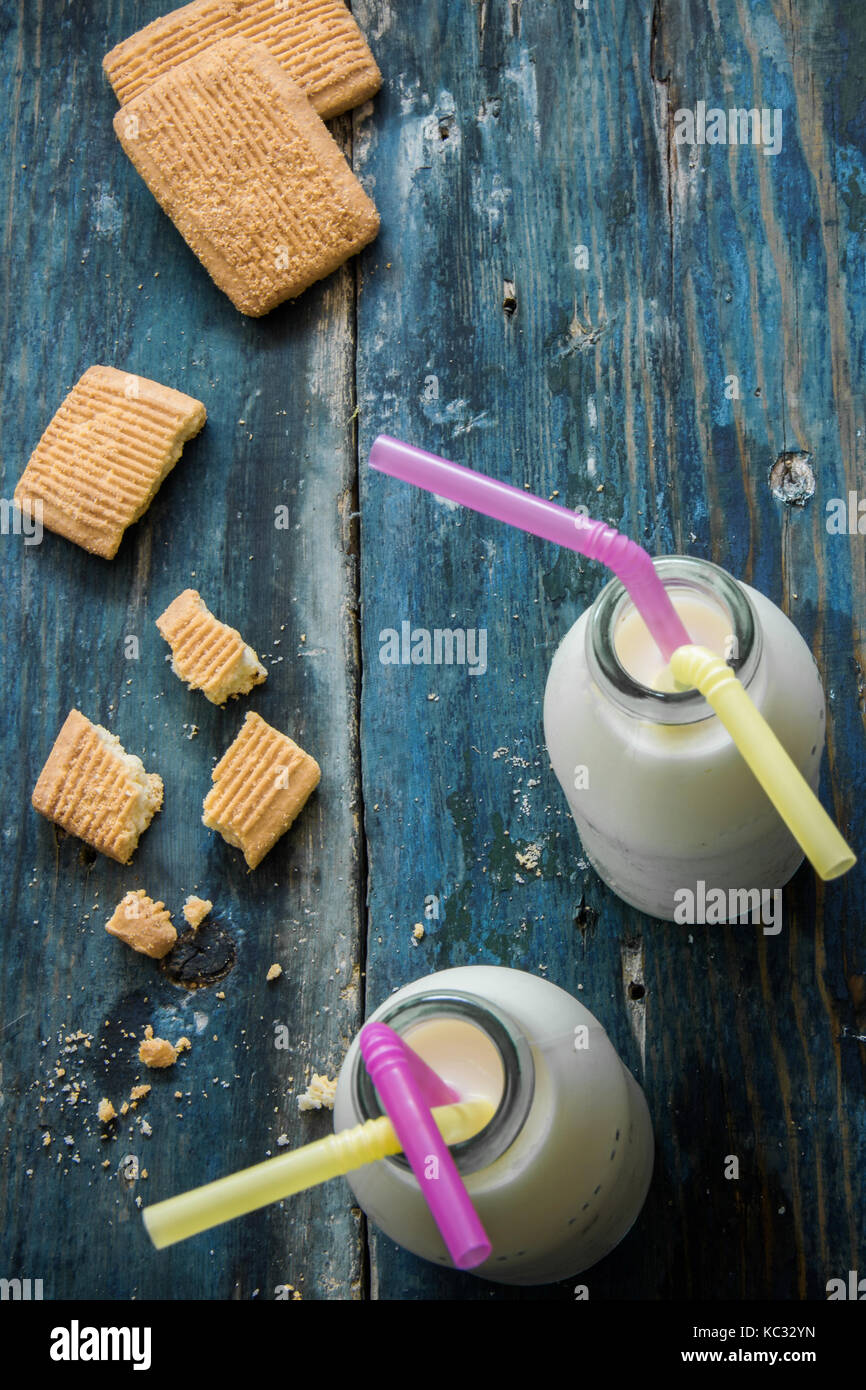 Traditional snack - milk and cookies for two Stock Photo - Alamy
