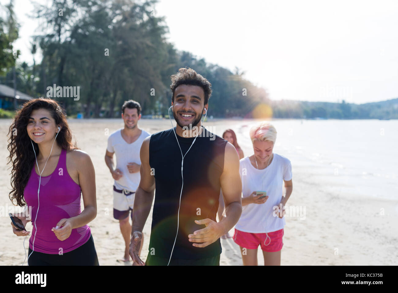 Group Of People Running, Young Sport Runners Jogging On Beach Working ...