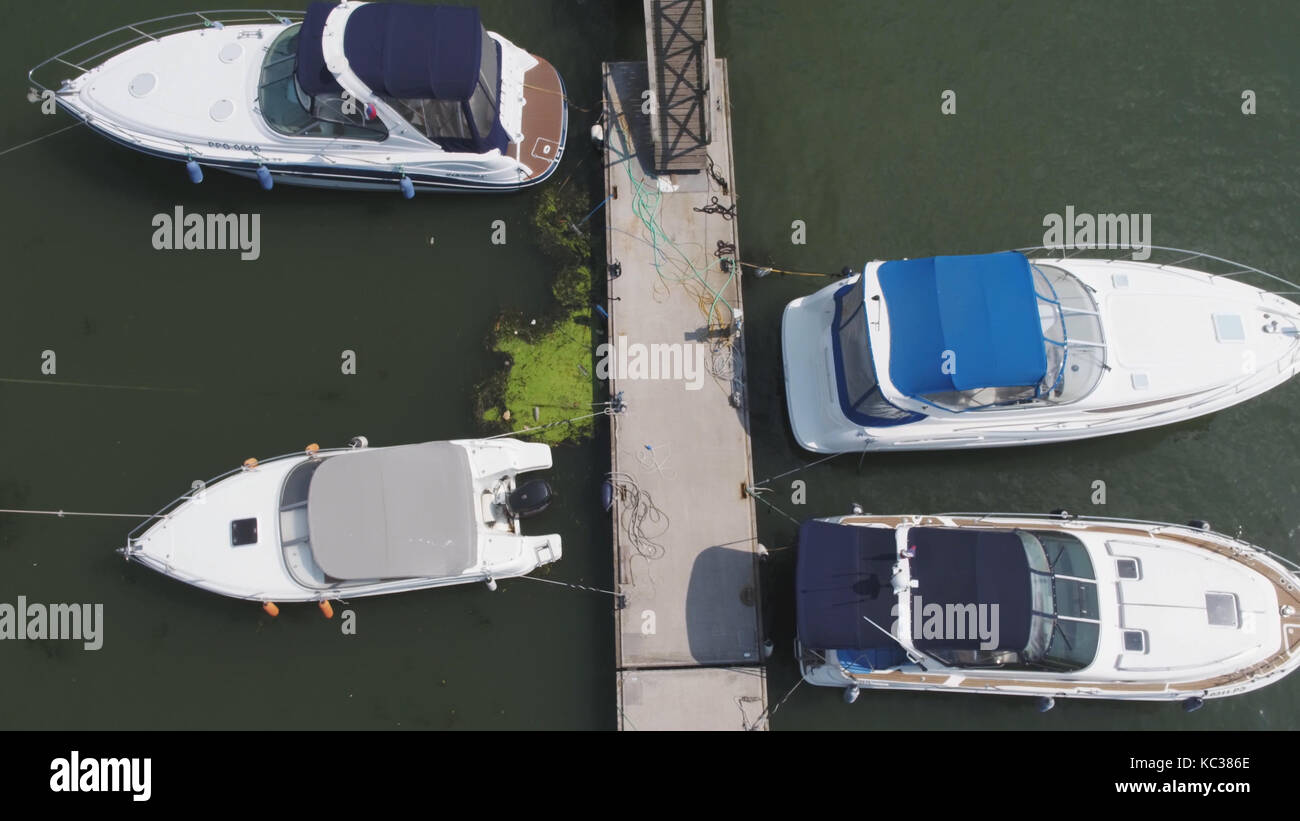 Sailboats moored in the port, a lot of beautiful yachts. Top view on ...