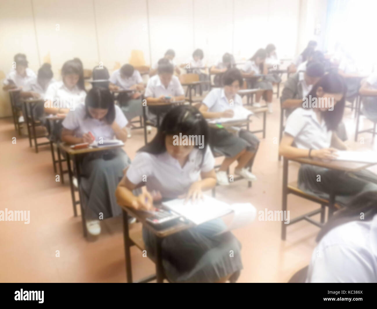 Students writing exam uniform hi-res stock photography and images - Alamy