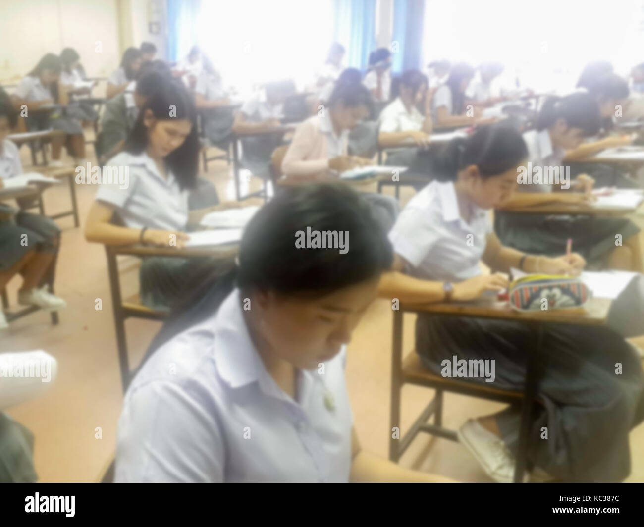 Students writing exam uniform hi-res stock photography and images - Alamy
