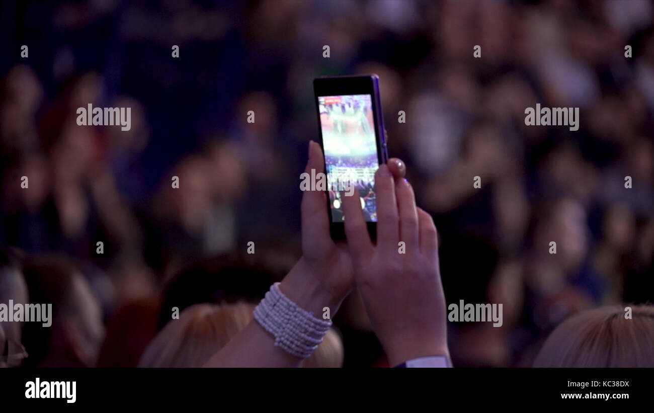 Shot on a phone of a Boxing fight in the ring. Boxing fight in the ring ...
