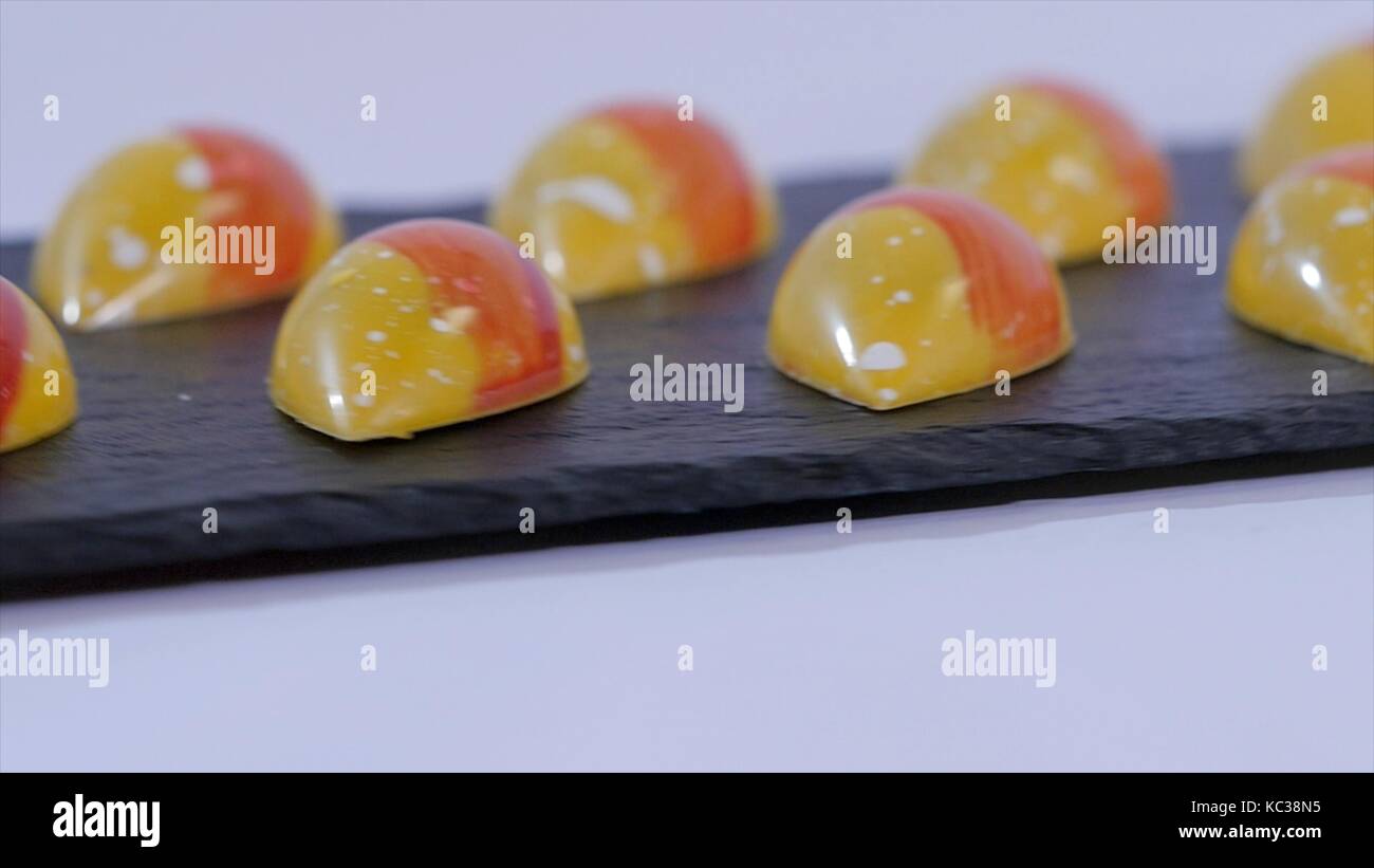 Colorful candies close up. Set of colorful lollipops. Red and yellow ...