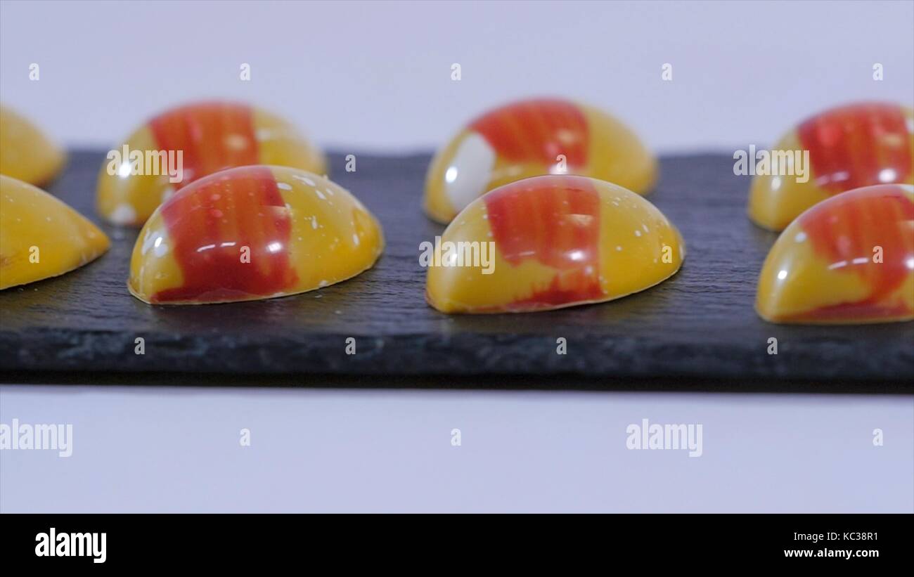 Colorful candies close up. Set of colorful lollipops. Red and yellow ...