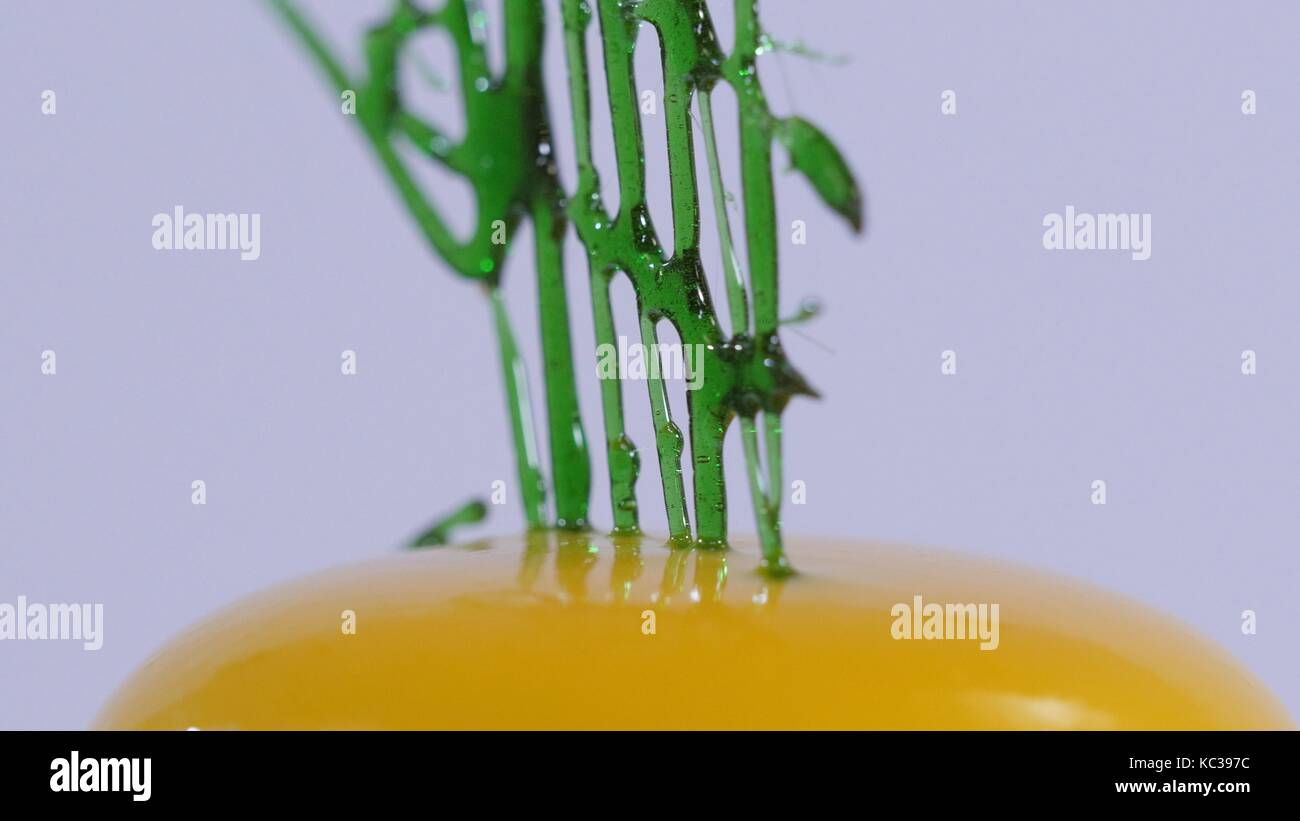 Modern mousse cakes with caramel glaze decorated for kids party. Yellow ...