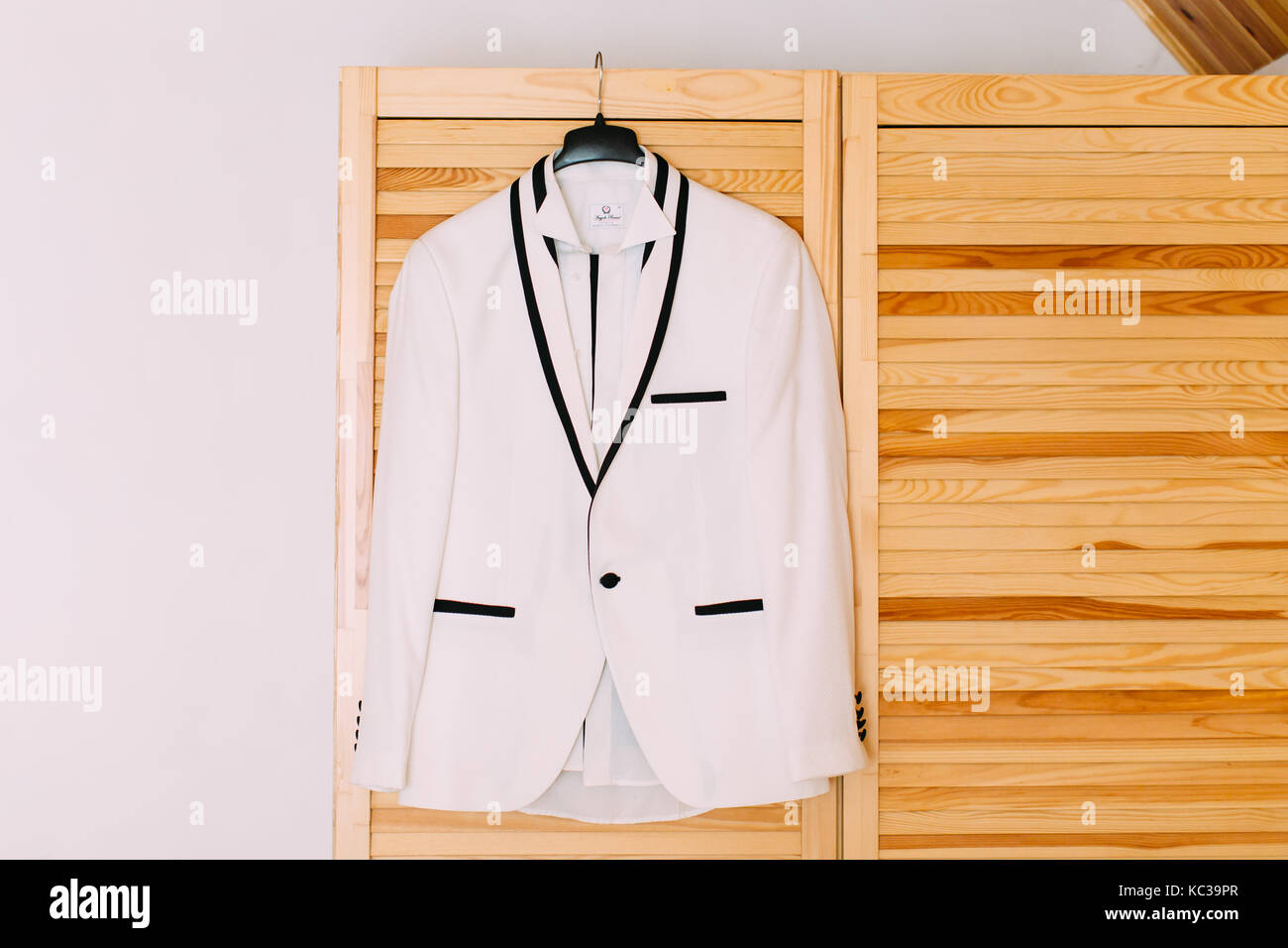 Hanging groom suit hi-res stock photography and images - Alamy