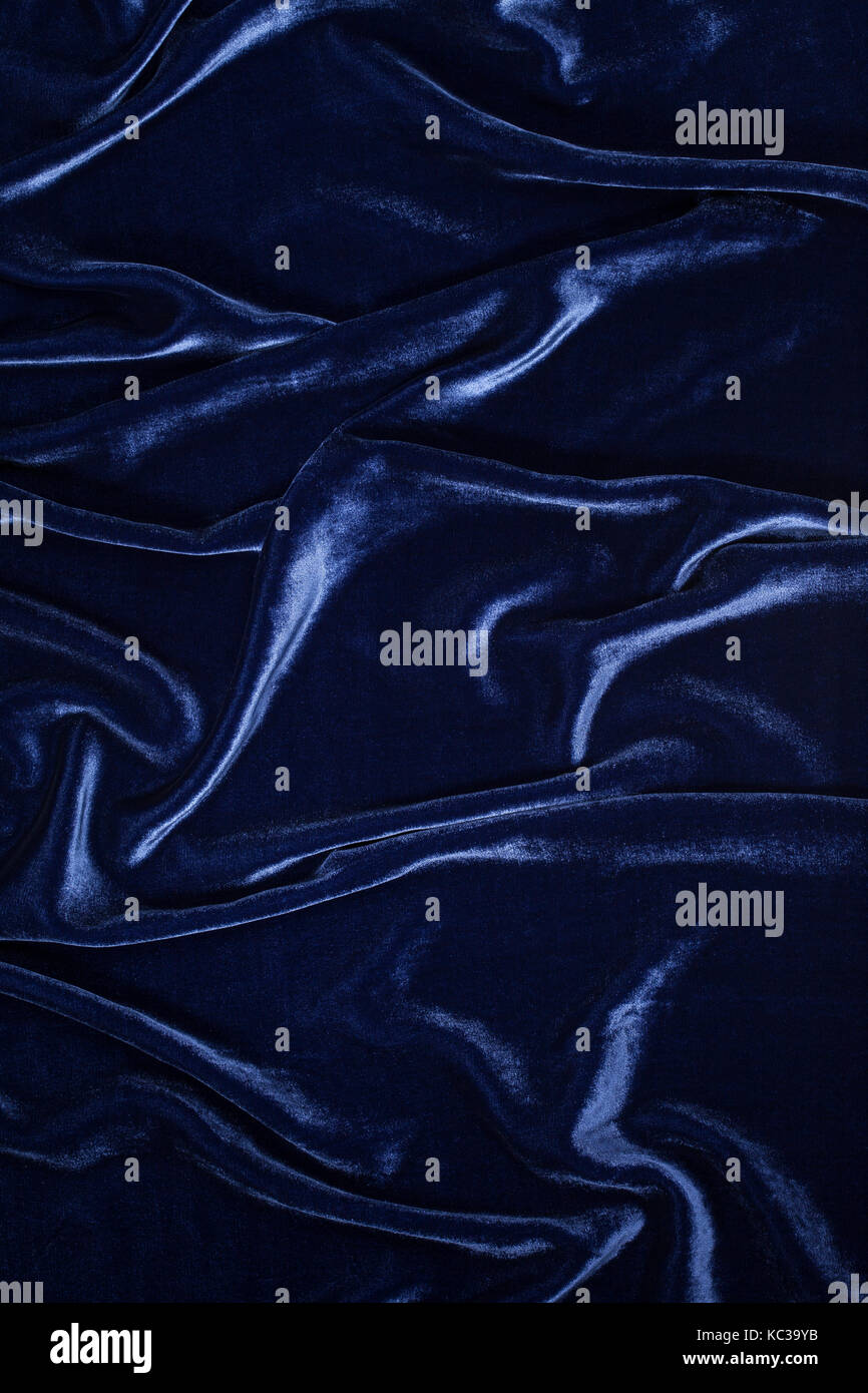 Luxurious waves of dark blue velvet background Stock Photo - Alamy